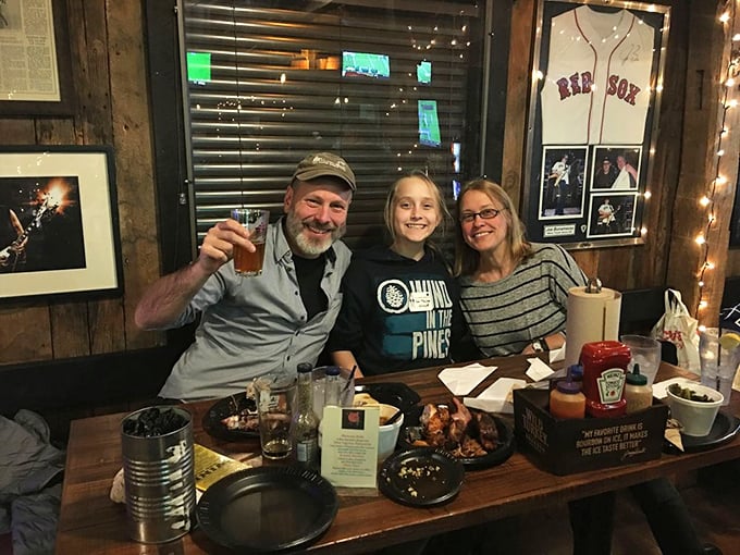 Happy faces around the table—the universal sign that barbecue is doing exactly what it's supposed to do.