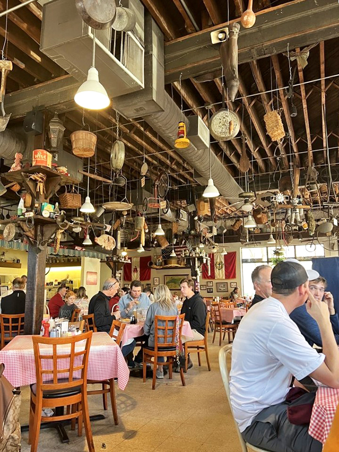 The ceiling collection of rural artifacts ensures your conversation never runs dry&mdash;"Is that a butter churn or modern art?"