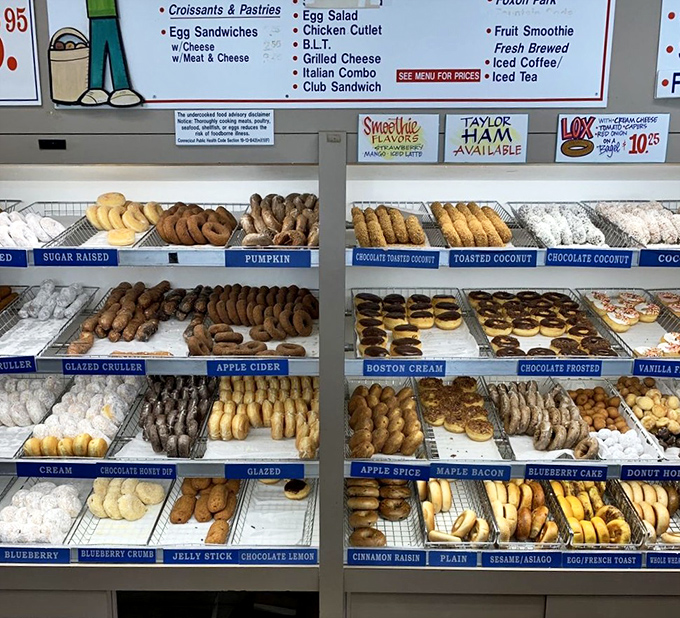 The display case at Whitney Donut - where diet resolutions go to die and breakfast dreams come true. 