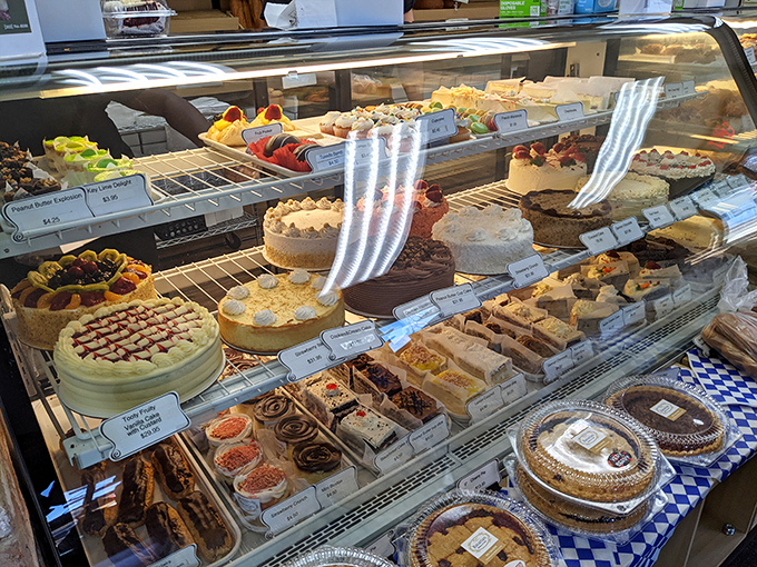 The glass case of temptation. Each shelf offers a different path to dessert nirvana&mdash;choose wisely, or better yet, choose often.