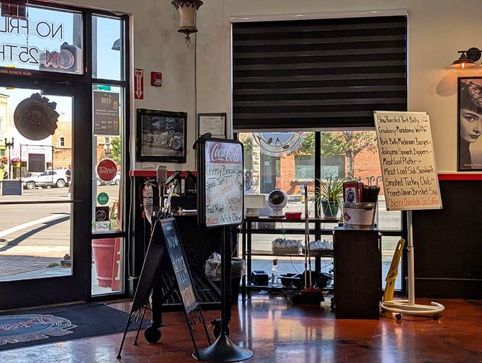 Handwritten specials board by the entrance – where daily inspirations meet hungry customers. The best kind of breaking news.