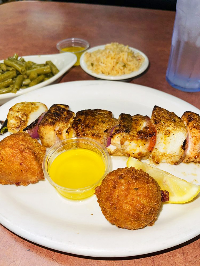 This seafood plate isn't just dinner&mdash;it's a vacation for your taste buds, complete with green beans and rice for the perfect getaway.