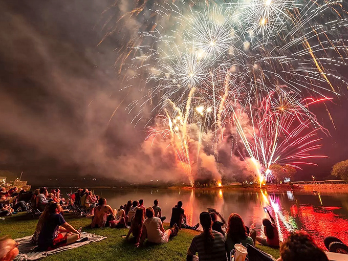 Fireworks over the White River create the perfect small-town symphony of light and color, where blankets on grass become front-row seats to summer magic.