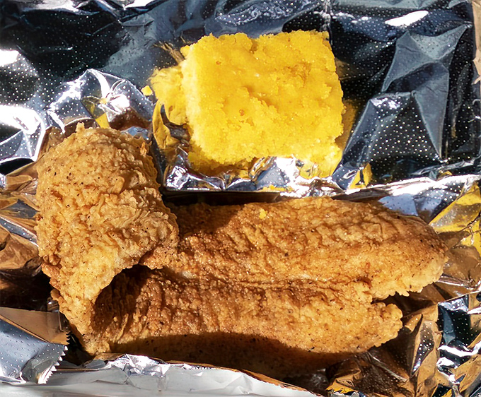 Golden-battered fried catfish and cornbread that looks like it could start a religion. Some meals aren't just food—they're spiritual experiences worth converting to.