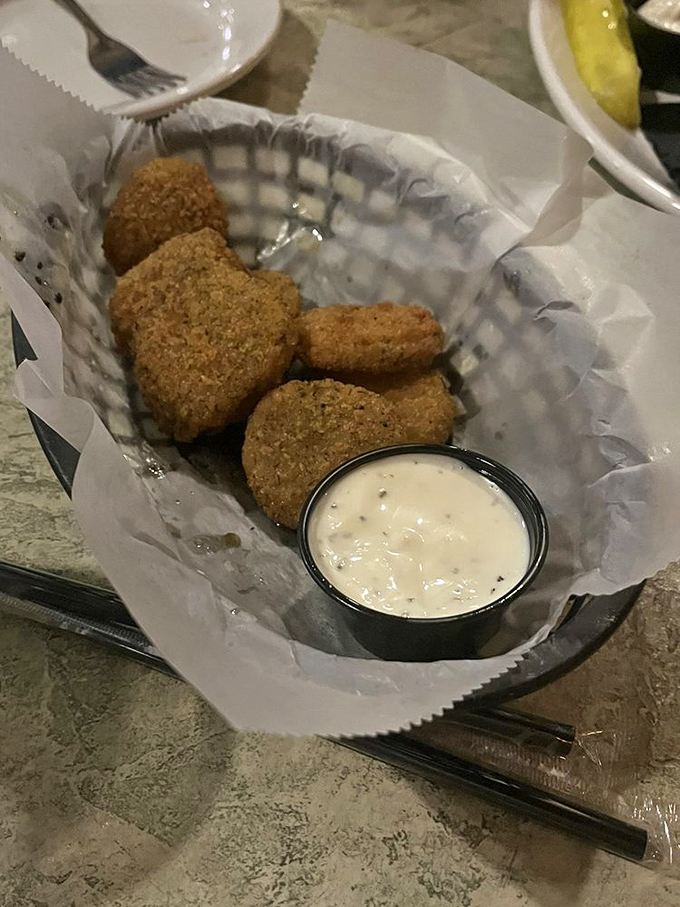 Fried pickles: the unsung heroes of bar food. Tangy, crunchy little discs of happiness that pair perfectly with cold beer.