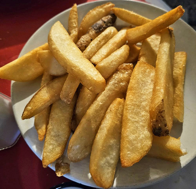 These aren't just fries – they're the supporting actors that deserve their own Academy Award for complementing seafood so perfectly.