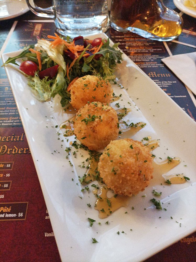 These golden-fried goat cheese balls are what would happen if comfort food got a PhD in sophistication.