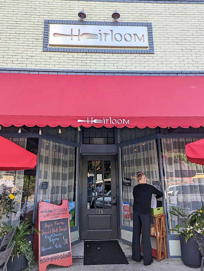 Heirloom's clever fork-and-spoon logo promises culinary creativity. That red awning signals "serious food happens here" to hungry passersby.
