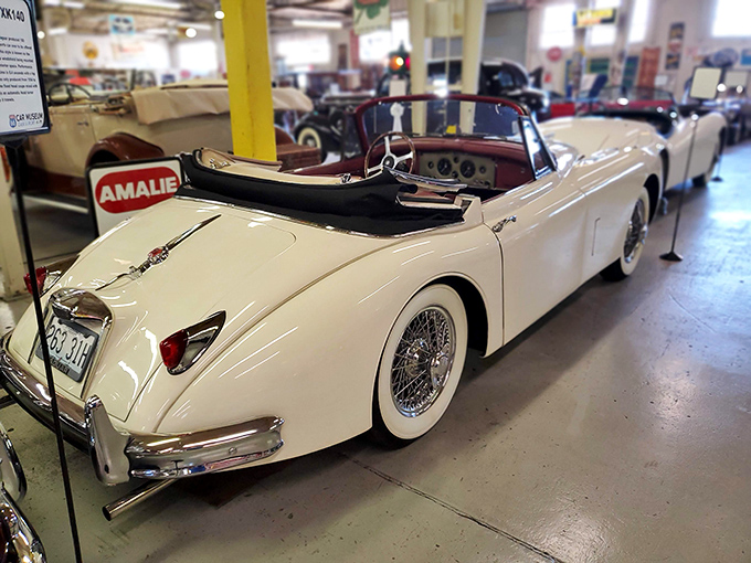 Jaguar's elegant curves whisper of British refinement. This white XK150 convertible practically begs for a countryside drive on a perfect spring day.