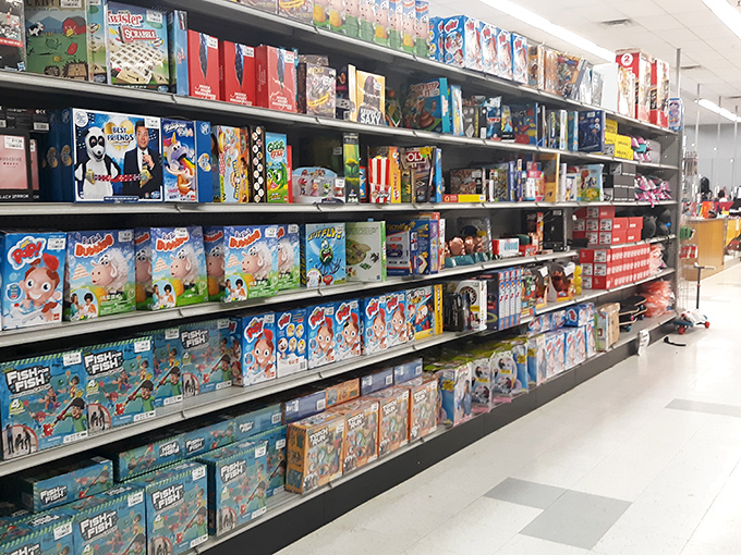 Board games and action figures stand at attention, ready to create childhood memories without creating parental debt.