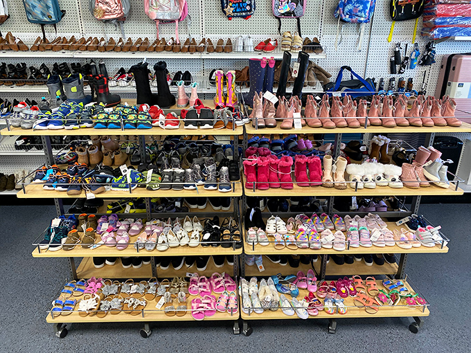 Kid's footwear arranged with military precision. The perfect place to handle that growth spurt without growing your credit card balance.