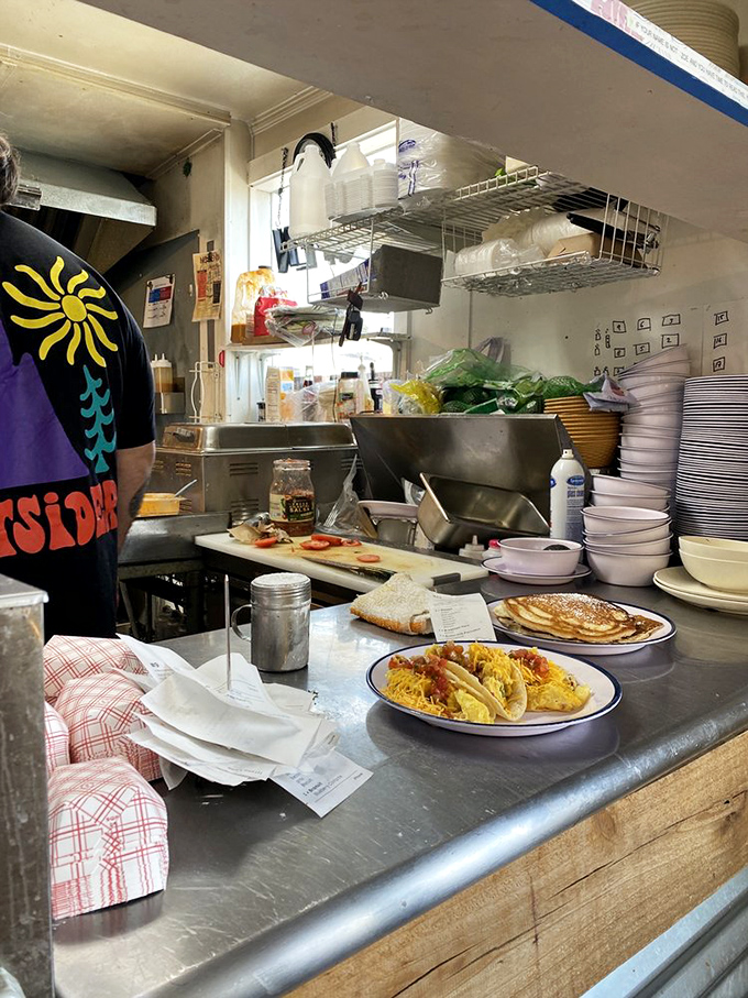 Behind the scenes, breakfast tacos and pancakes await their moment of glory before heading to their destiny on hungry diners' plates.