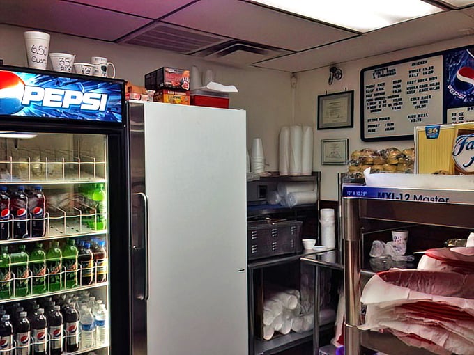 Behind the scenes, where soda meets smoke. This no-nonsense setup tells you they're focused on what matters&mdash;not fancy d&eacute;cor, but fantastic barbecue.