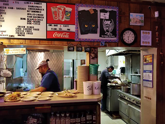 Behind the scenes, where burger alchemy transforms simple ingredients into legendary meals. The kitchen's choreography is as practiced as a Broadway show.