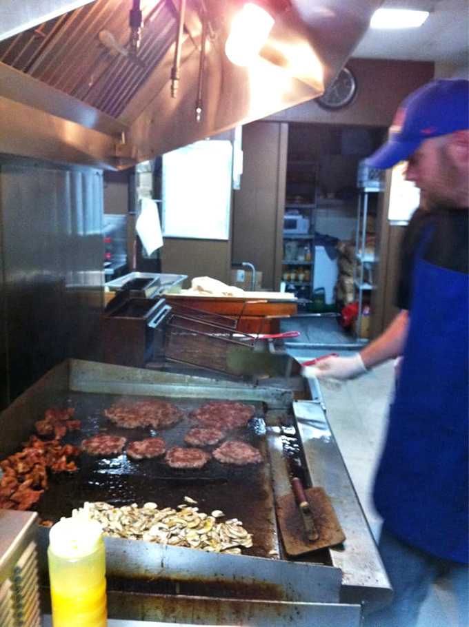The flat-top grill&mdash;hallowed ground where patties transform from mere meat to legendary status. That sizzle is nature's perfect soundtrack.