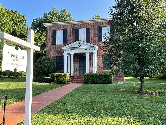 The stately Masonic Hall has witnessed generations of Hillsborough history, its classic columns and brick façade unchanged while the world transformed around it.