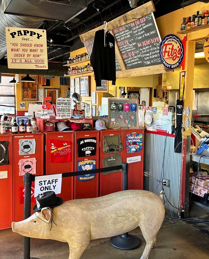 The merchandise counter doubles as barbecue mission control. That pig statue has seen things &ndash; mostly people having religious experiences over ribs.