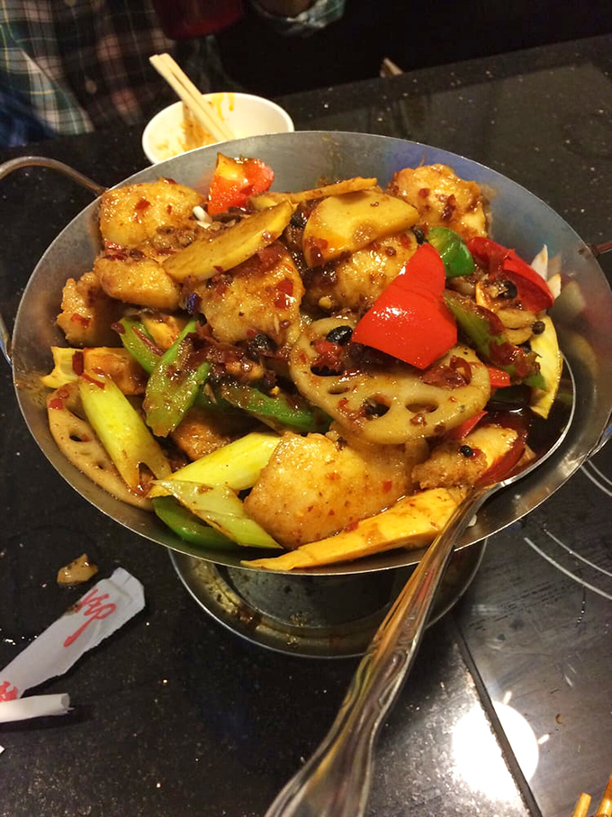 A mini pot fish creation that looks like it belongs in a food magazine spread, not a humble buffet in the heartland.