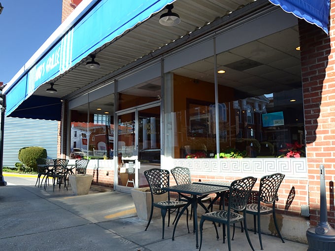 Niko's Grille offers sidewalk seating perfect for people-watching while refueling between antiquing expeditions. The Greek key pattern promises Mediterranean flavors.