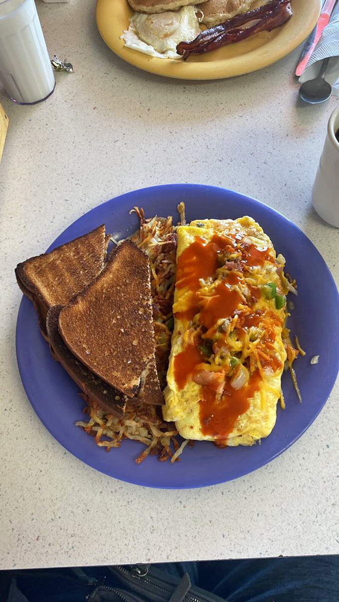 This omelet has more personality than most people you'll meet today, with hot sauce adding just the right amount of morning excitement.