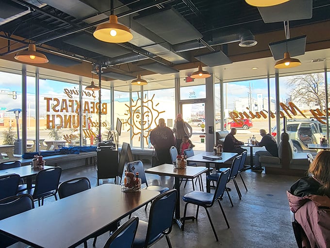 Sunshine streams through windows illuminating blue chairs waiting for hungry patrons&mdash;like a Edward Hopper painting with better breakfast options.