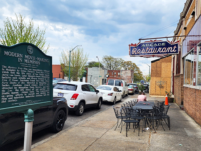 Outside seating where Memphis history meets modern-day dining. That historical marker reminds you that hash browns taste better with a side of significance.