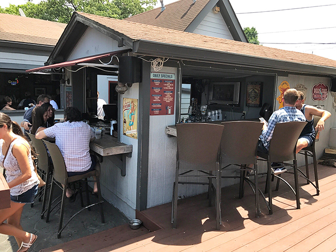 The outdoor bar&mdash;where vitamin D meets vitamin "cocktail" and summer afternoons stretch into evening without anyone minding the clock.