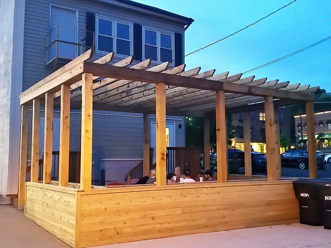 The outdoor patio &ndash; where ice cream tastes even better under the soft glow of twilight, as downtown Eau Claire provides the perfect backdrop.