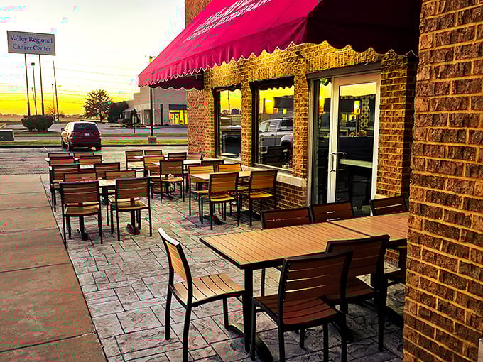 Outdoor seating under that signature red awning&mdash;where summer evenings transform ordinary dinners into memory-making experiences under Illinois skies.