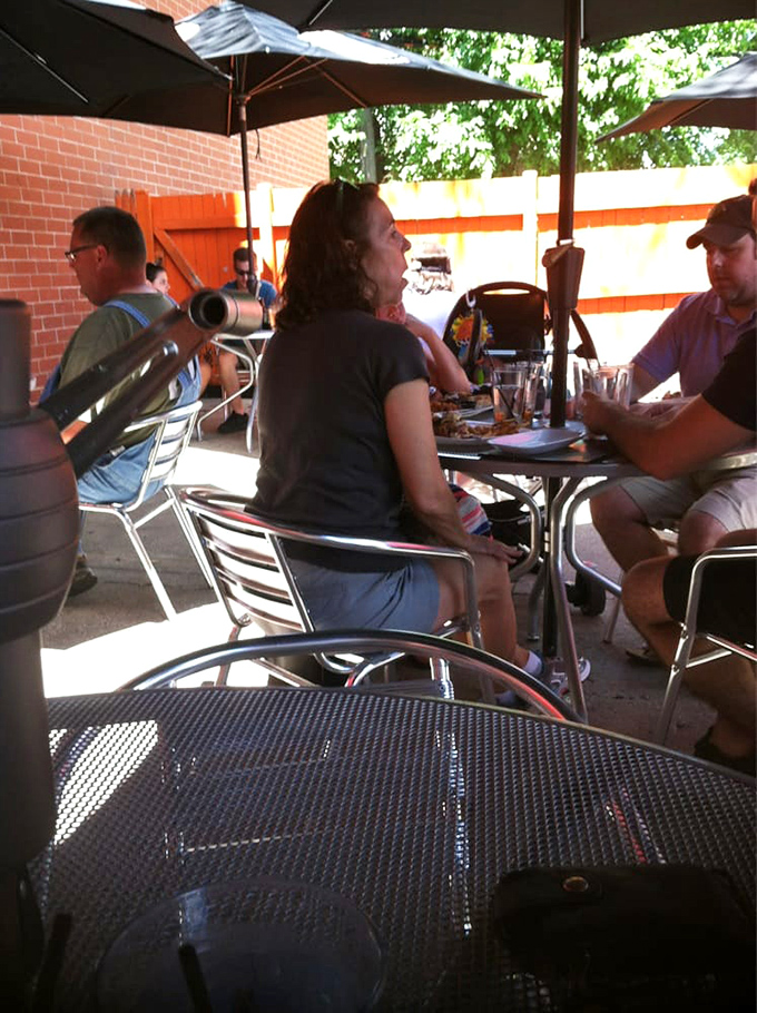 The outdoor seating area offers a chance to recover between bites while still being part of the Kuma's experience. Sunglasses strongly recommended.