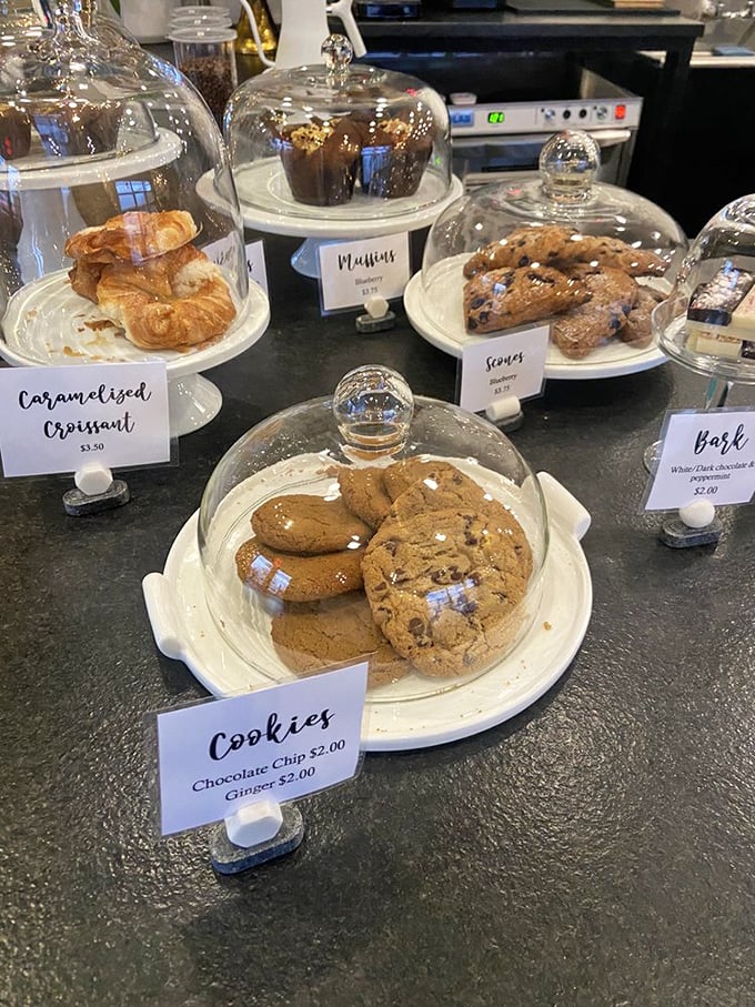 Pastry paradise under glass. These cookie and croissant domes aren't just displays&mdash;they're transparent temples of temptation for the sweet-toothed pilgrim.
