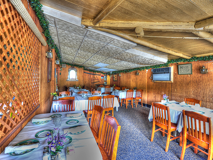 Sunlight streams through this dining space where white tablecloths meet wooden walls&mdash;the perfect setting for both special occasions and "just because it's Wednesday" meals.