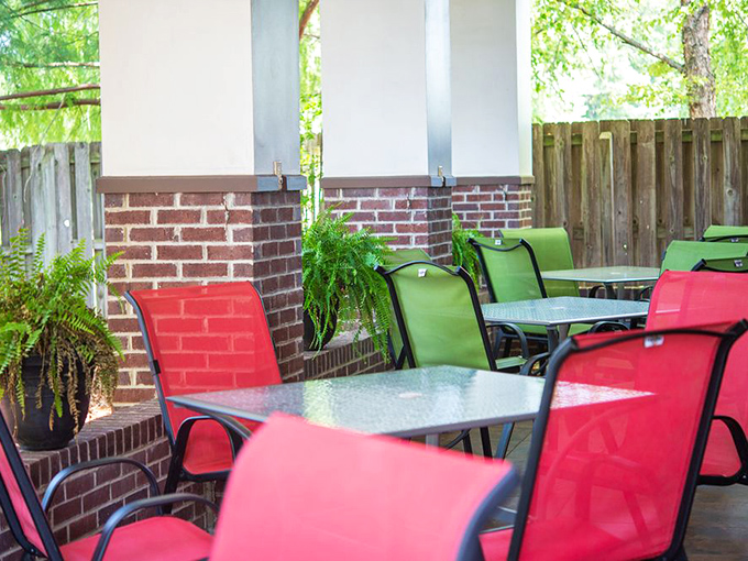 The patio offers al fresco dining with pops of color that brighten both the space and your mood before the first bite.