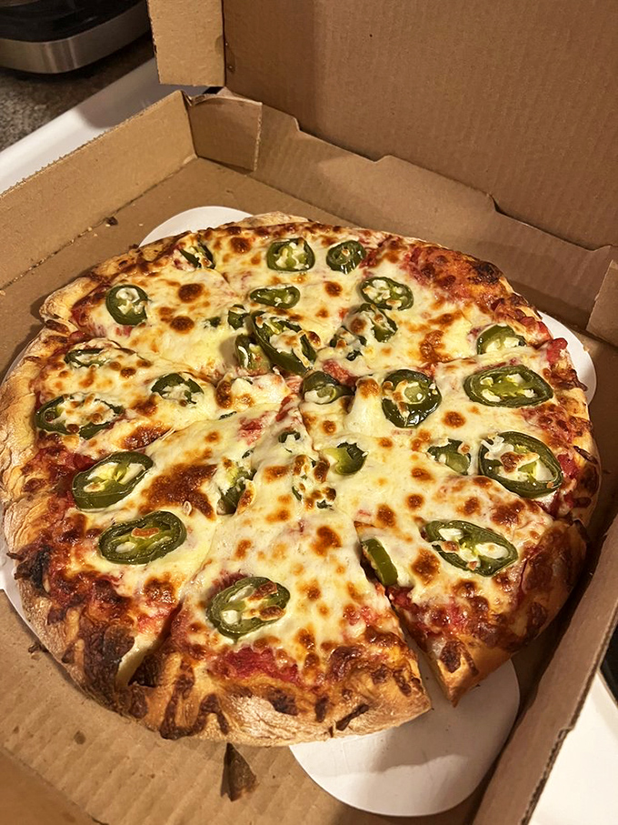 A pizza that proves you don't need fancy wood-fired ovens or imported water to create the perfect balance of crust, sauce, cheese, and jalapeño heat.