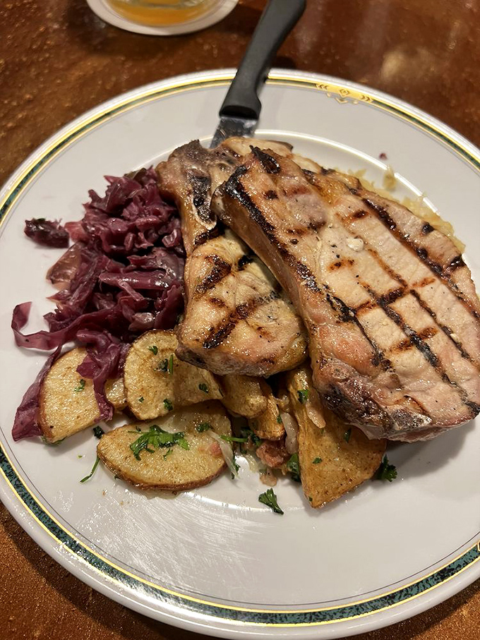 Grill marks on pork: nature's way of saying "You're about to have a really good day," accompanied by potatoes that didn't come to mess around.