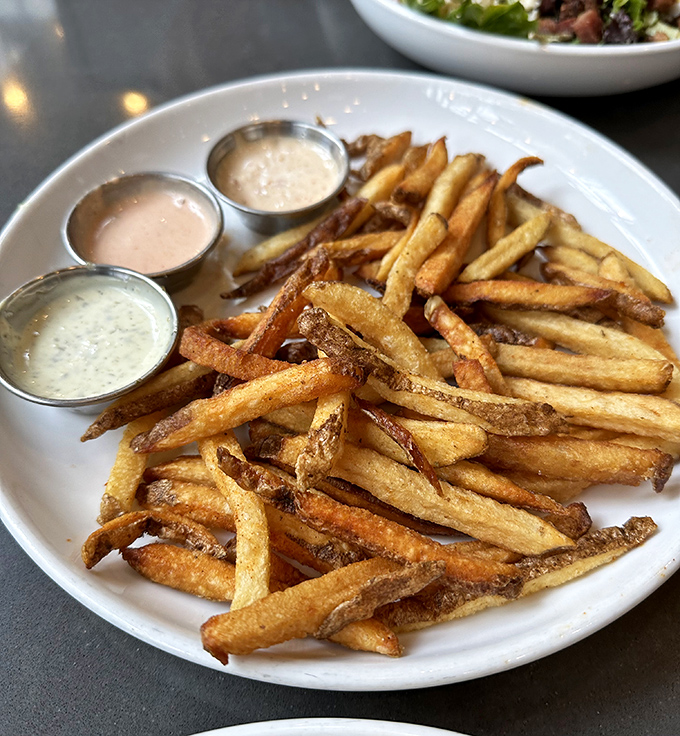 House-cut fries with three dipping sauces&mdash;because choosing just one would be like picking a favorite child. Crispy on the outside, fluffy within.