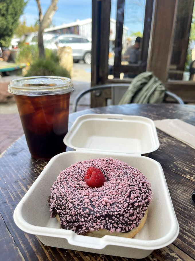 That raspberry donut looks like it was designed by someone who understood both confectionery and color theory. Berry brilliant, if you ask me.