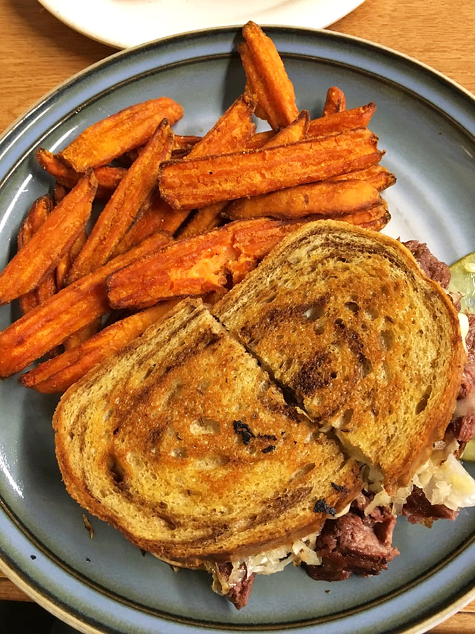 The Reuben sandwich and sweet potato fries create a perfect marriage. Toasty, tangy, and tender &ndash; the relationship counselor of lunch options.