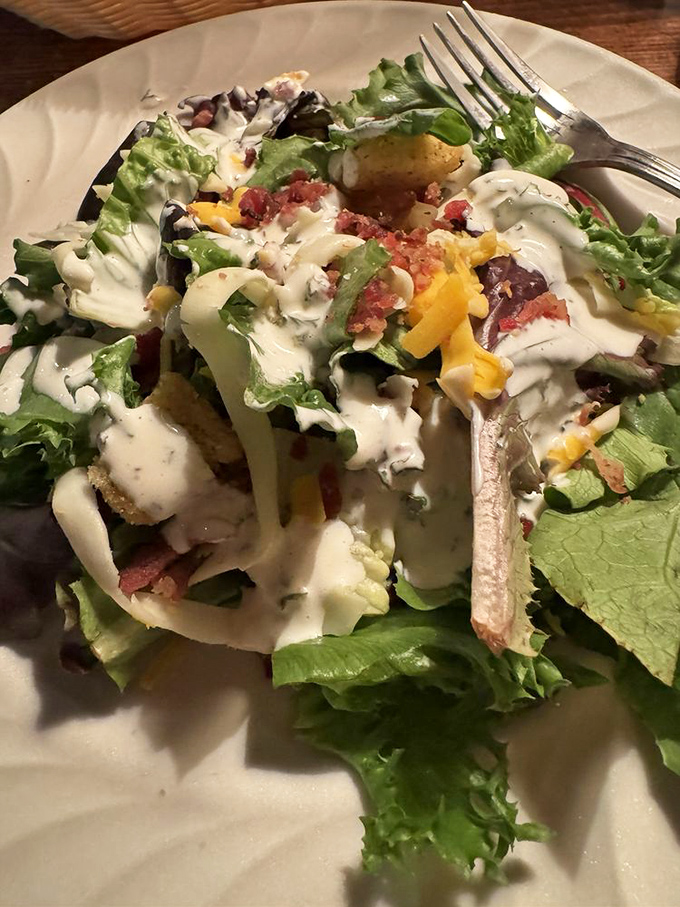 A salad that actually makes you forget you came for the meat&mdash;crisp, colorful, and dressed better than most people at the theater.