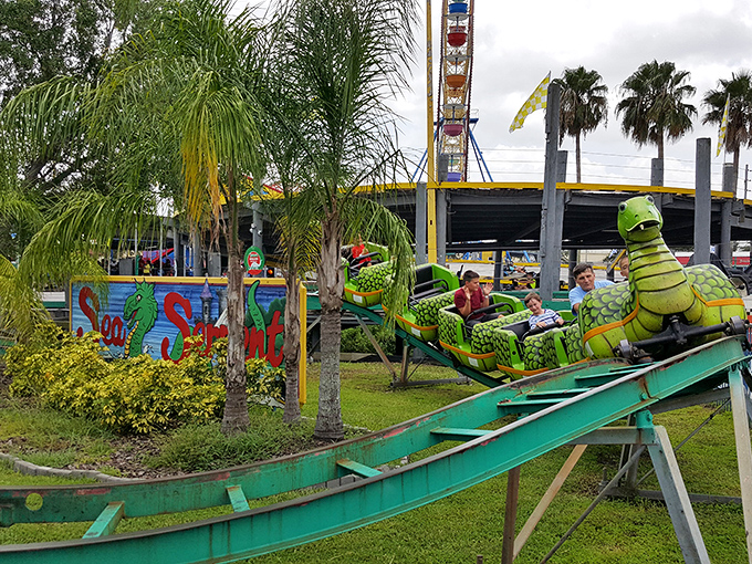 The sea serpent coaster delivers kid-friendly thrills with its colorful reptilian charm&mdash;the perfect "my first roller coaster" experience for budding thrill-seekers.