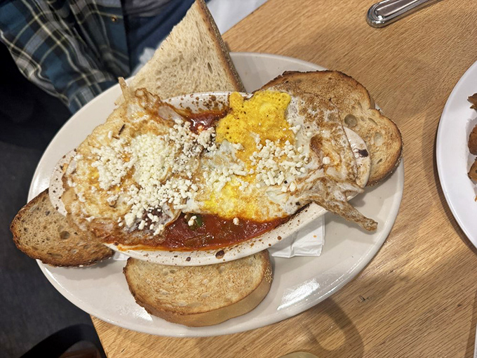 Shakshouka that brings Mediterranean sunshine to Boston, with eggs poached in a tomato sauce so good you'll want to drink the leftovers.