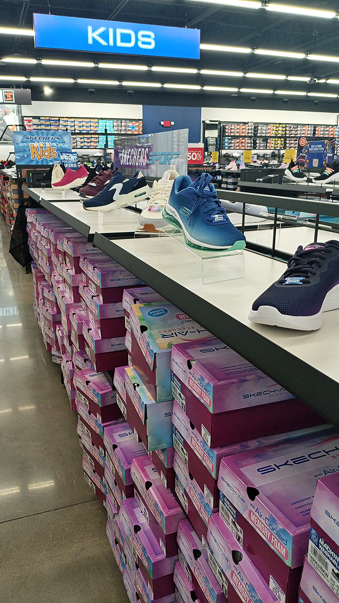 The Skechers kids' section displays its colorful wares like an art installation dedicated to the proposition that children's feet grow suspiciously fast.