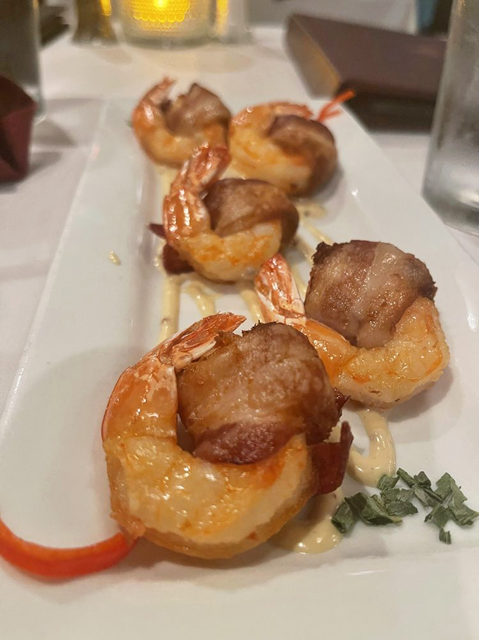 Bacon-wrapped shrimp: proof that sometimes the best relationships are the unexpected ones. A little surf, a little turf, a lot of happiness.