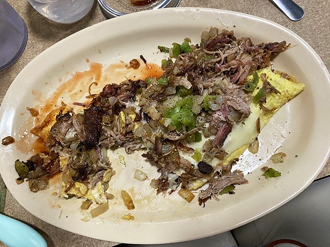 This isn't just breakfast&mdash;it's a carnivore's morning masterpiece, where eggs serve as the canvas for a beautiful arrangement of savory delights.