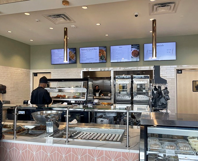 Behind every great Southern meal is a kitchen team that knows their craft. The modern setup doesn't hide the traditional techniques at work.