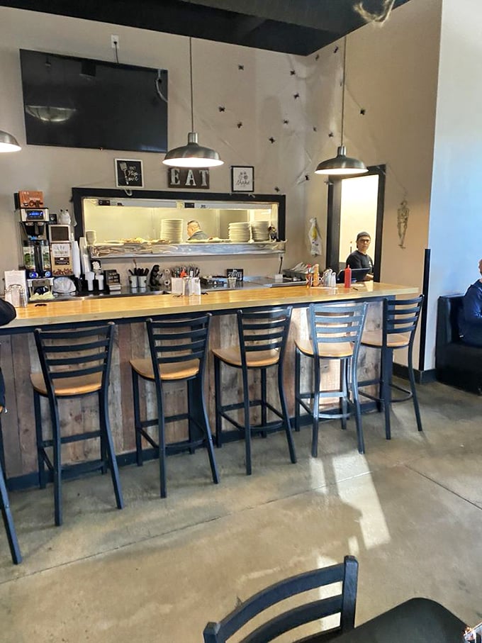 The counter seating offers front-row tickets to the breakfast show, where you can watch kitchen magic happen while sipping your coffee.