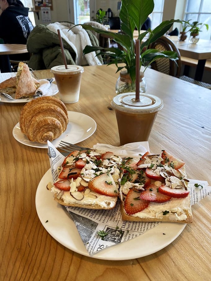Strawberry toast that bridges the gap between breakfast and dessert&mdash;fresh fruit and herbs elevating morning carbs to something worth documenting.