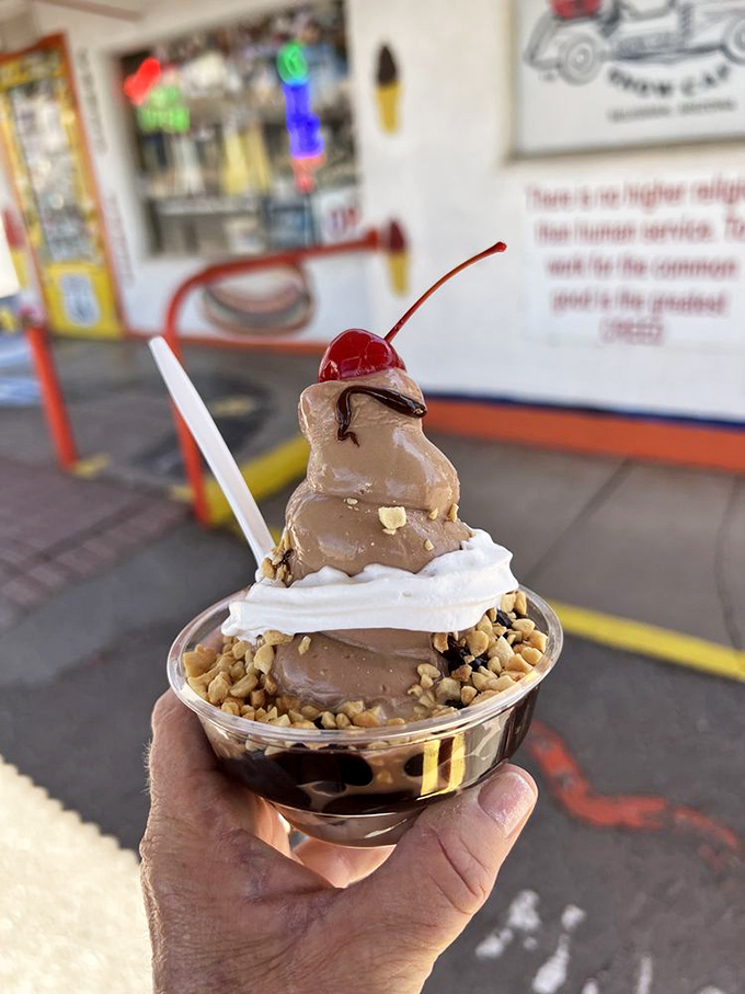 This sundae doesn't just satisfy your sweet tooth&mdash;it throws a party for it, complete with whipped cream, nuts, and a cherry on top.