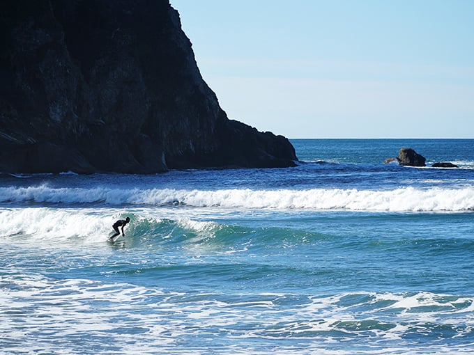 The perfect wave awaits as a lone surfer demonstrates why wetsuit sales in Oregon outpace swimsuits. Worth every goosebump.