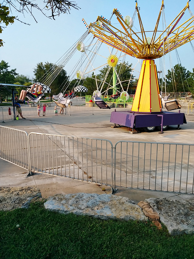 As the swing ride catches the golden hour light, riders experience that magical moment when centrifugal force meets sunset&mdash;pure amusement park poetry in motion.